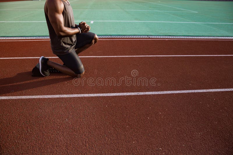 Cropped Image of a Young Athletic Man on Track Stock Photo - Image of ...