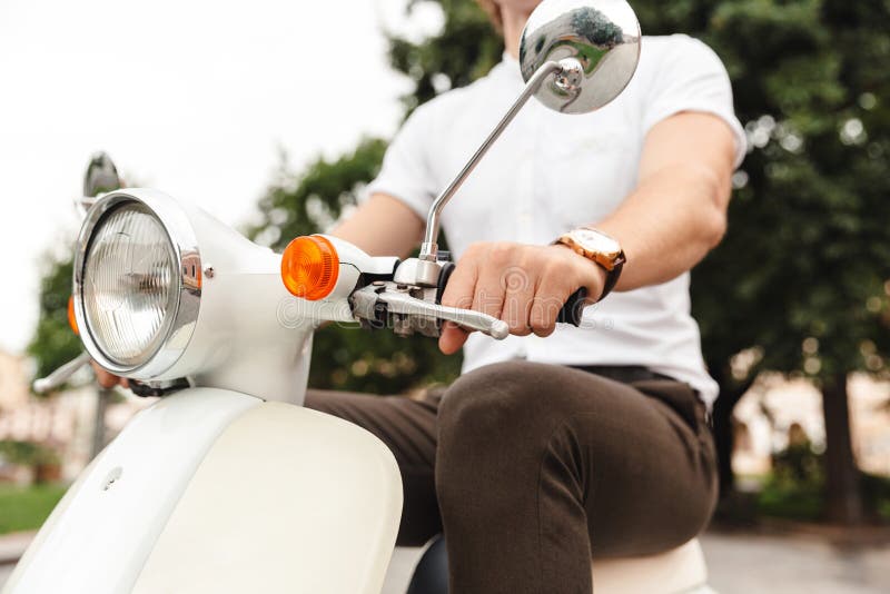 Cropped Image of Young Business Man Riding on Retro Scooter Stock Image ...