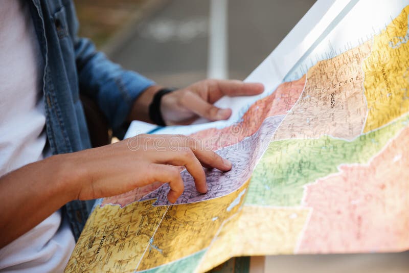 Cropped Image of Young Man Looking at Map Stock Photo - Image of park ...