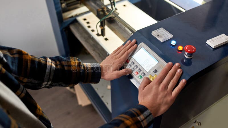 Cropped Male Worker Pressing Button on CNC Machine Stock Image - Image ...