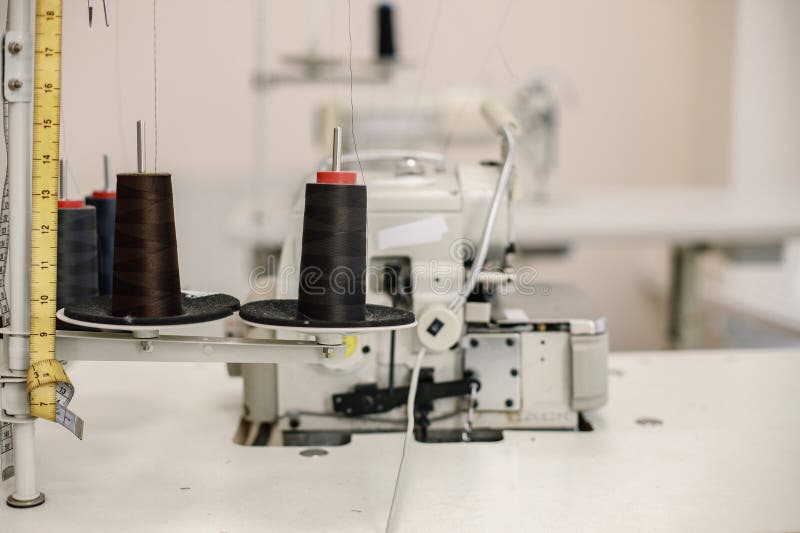 Cropped Photo of Black Spools of Thread on Sewing Machine Stock Image ...