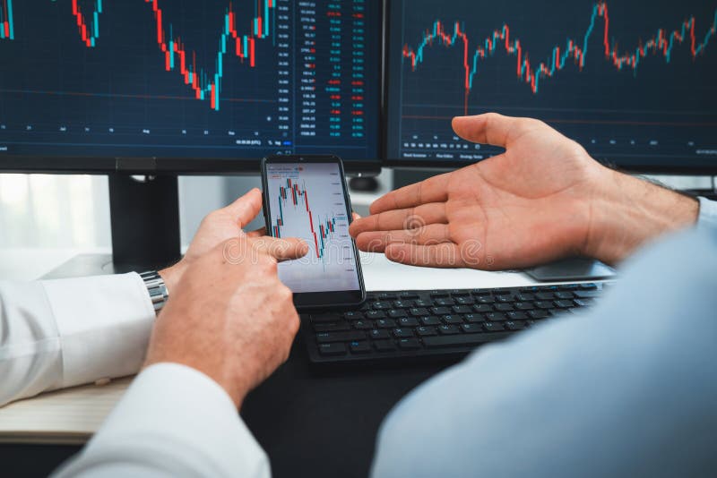 Cropped Photo of Traders Pointing Lowest on Smartphone on Hands Focus ...