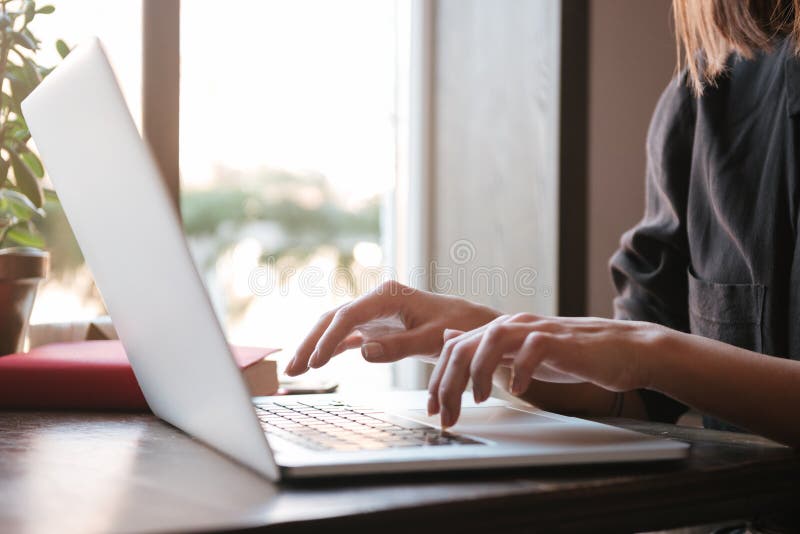 Cropped Photo of Young Lady Using Laptop Computer. Stock Photo - Image ...