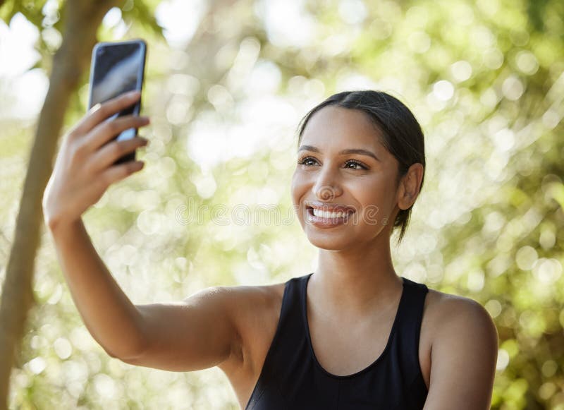 Mid Workout Selfies Cropped Shot Of An Attractive Young Female Athlete