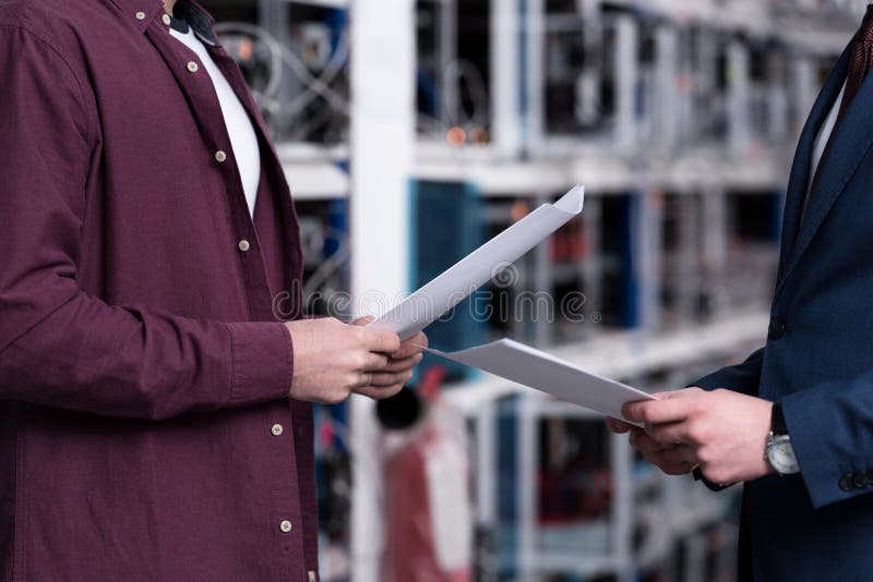 Cropped Shot of Businessman and Computer Engineer Working Together at ...