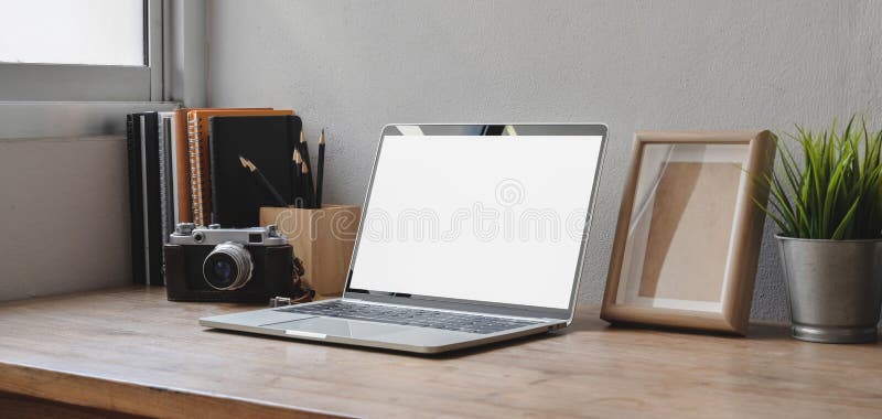 Cropped Shot of Comfortable Workspace with Blank Screen Laptop Computer ...