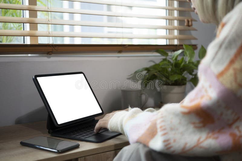 Female Browsing Internet with Computer Tablet at Home. Stock Image ...