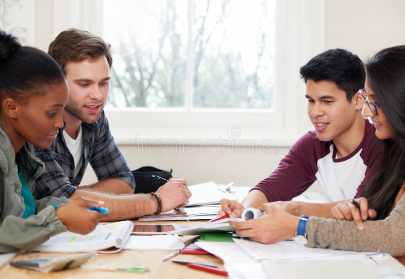 Studying with Friends. Cropped Shot of a Group of University Students ...