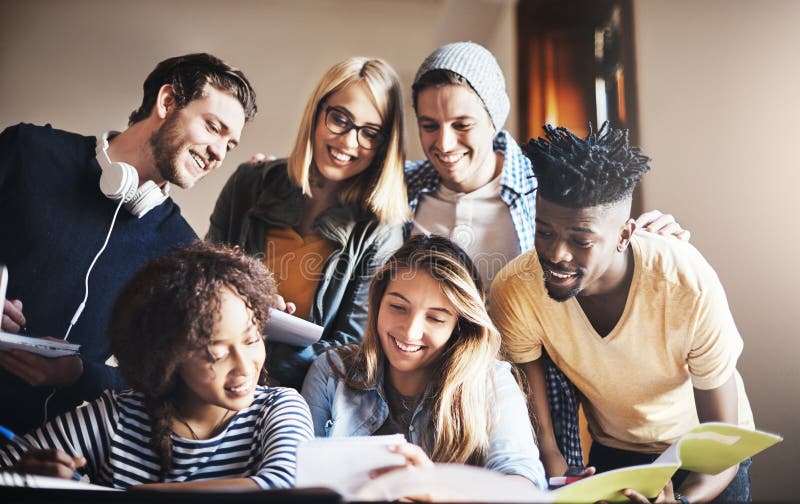 Looking at the New Assignment Together. Cropped Shot of a Group of ...