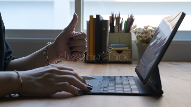 Man Showing Thumb Up while Using Laptop at Office Desk. Stock Photo ...