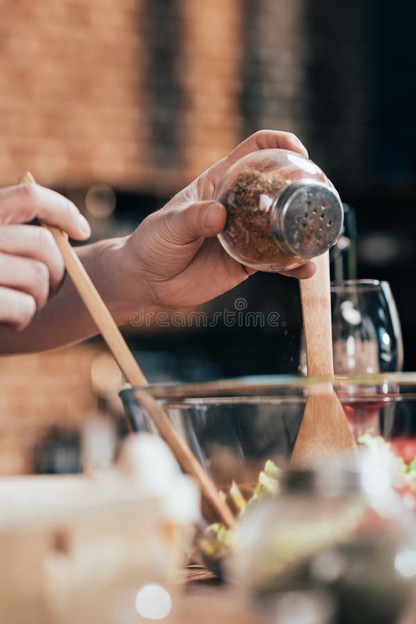 Cropped Shot of Person Adding Spices while Stock Image - Image of hands ...