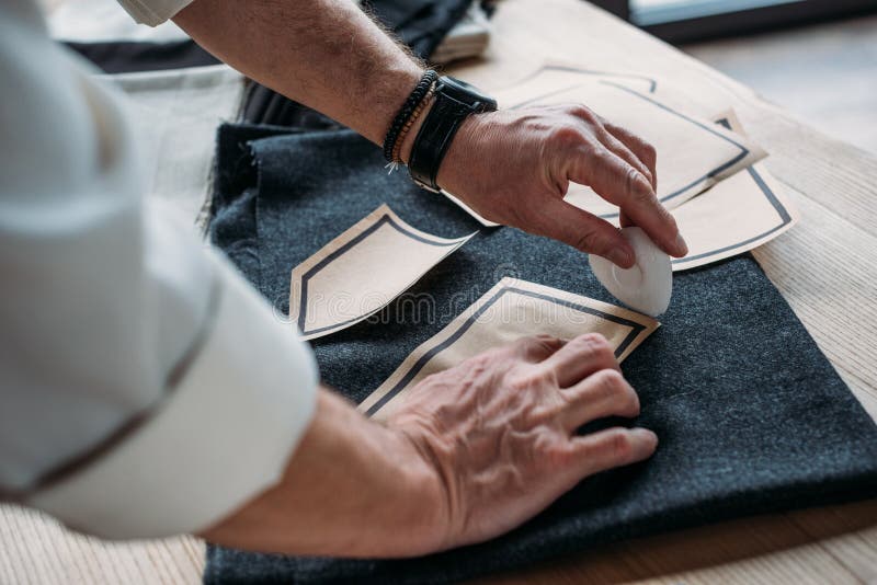Cropped Shot of Tailor Marking Cloth Pattern with Chalk Stock Image ...