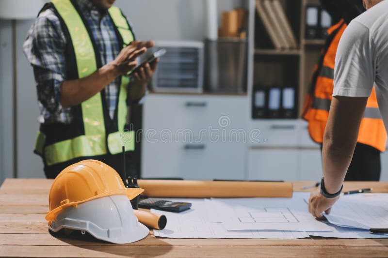 Cropped Shot Two Young Architects Working Together on a Building ...