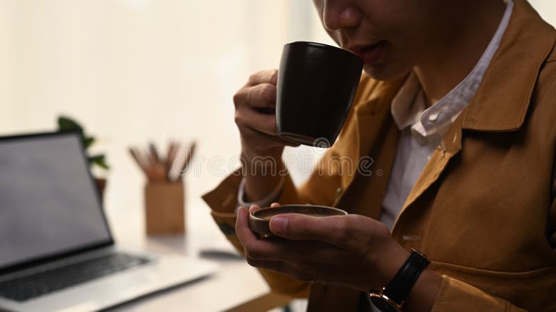 Young Man Drinking Coffee in the Morning before Work at Home Office ...