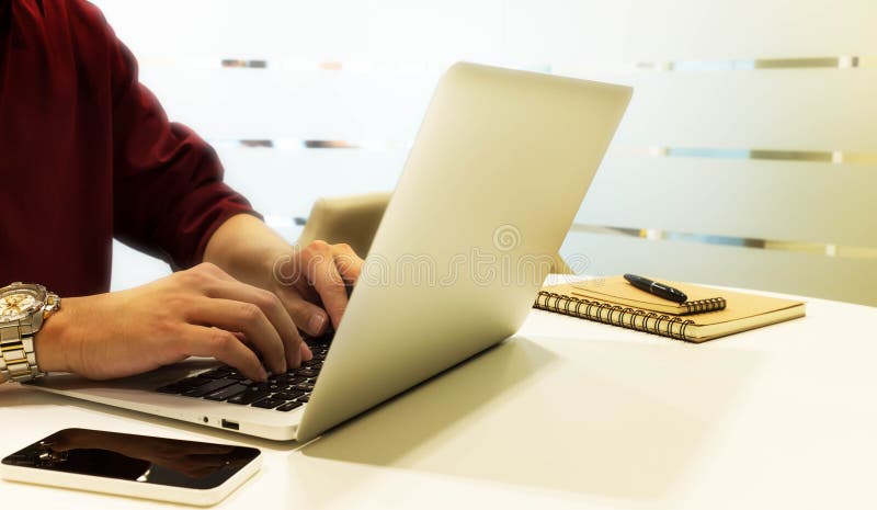Cropped Shot of a Young Man Working from Home Using Laptop Computer ...