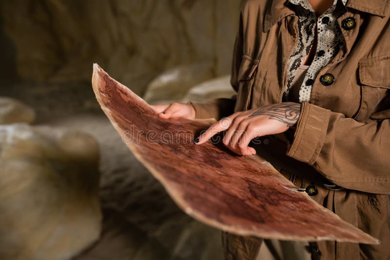 Cropped View of Archaeologist in Brown Stock Image - Image of brown ...