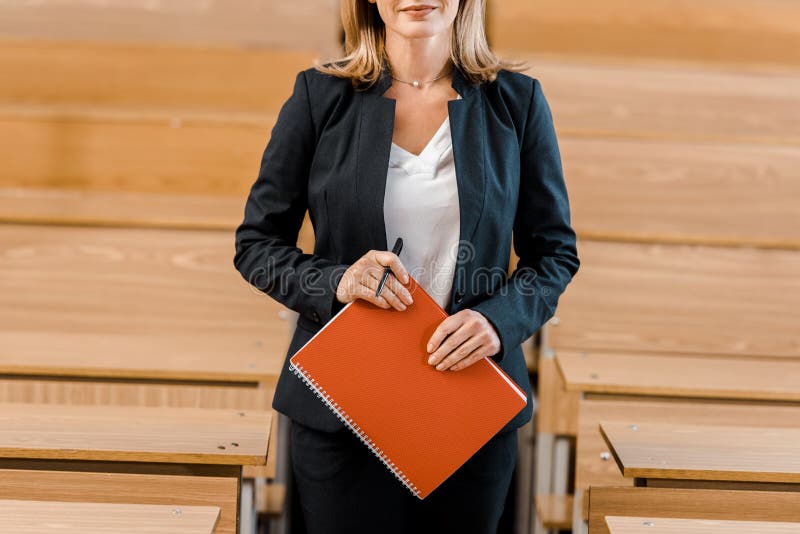 Cropped View of Female University Professor Holding Journal Stock Photo ...
