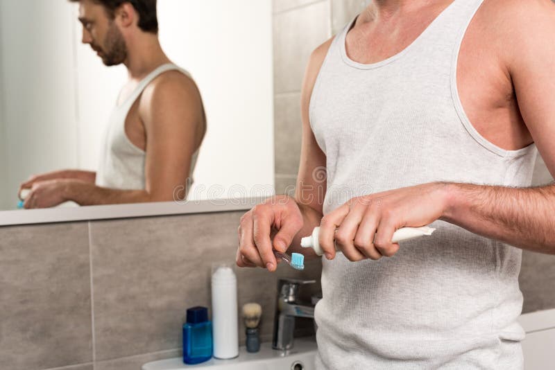 Cropped View of Man Applying Toothpaste on Toothbrush Stock Image ...