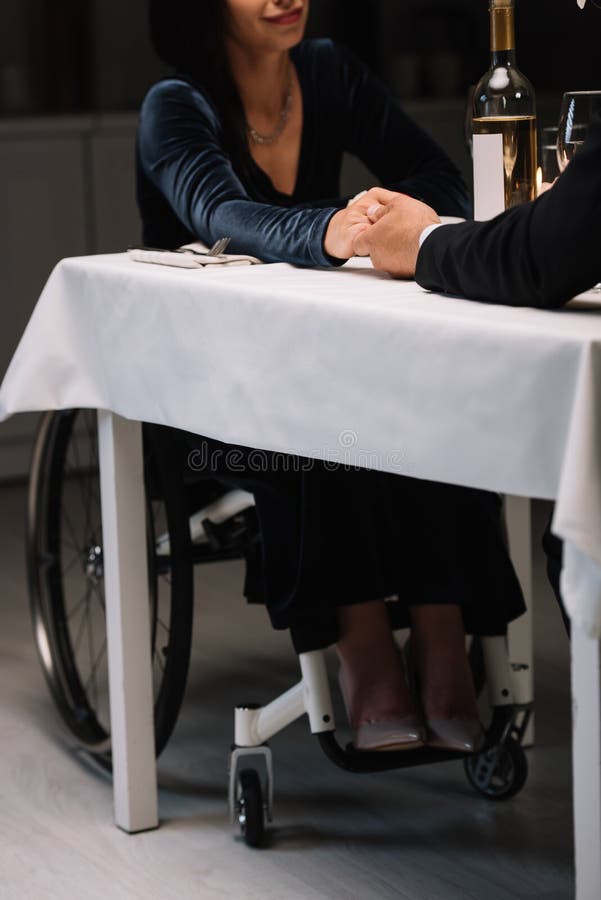 View of Man Holding Hands with Disabled Girlfriend during Romantic ...