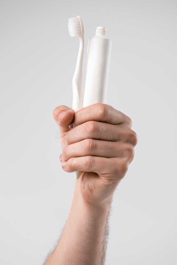 Cropped View of Man Holding Toothbrush and Toothpaste, Stock Photo ...