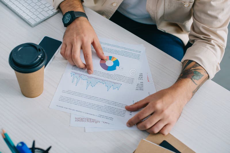 Cropped View of Man Looking at Documents Stock Photo - Image of office ...