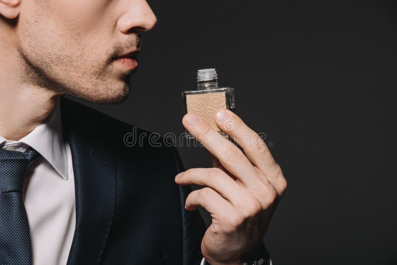 Cropped View of Man in Suit Smelling Perfume Isolated Stock Image ...