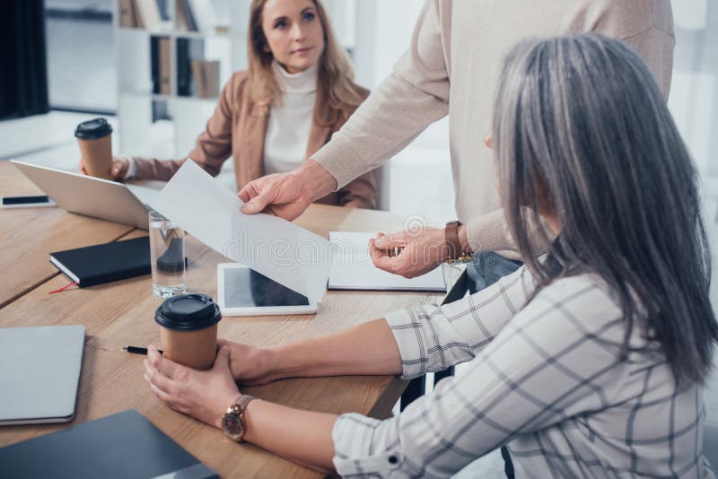 View of Man Showing Document To Stock Image - Image of surface, indoors ...
