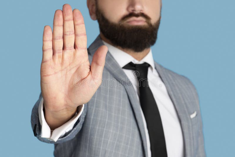 Cropped View of Millennial Businessman Refusing Something, Showing STOP ...