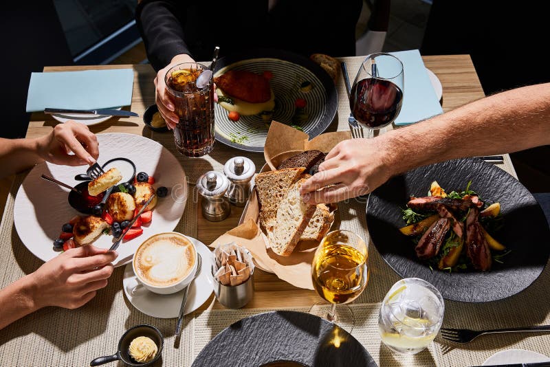 Cropped View of People Eating Delicious Stock Photo - Image of ...