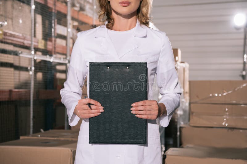 Cropped View of Storekeeper in White Stock Photo - Image of uniform ...
