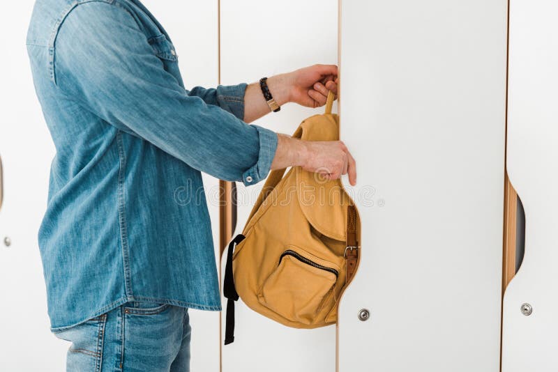View of Student with Backpack Opening Locker Stock Photo - Image of ...
