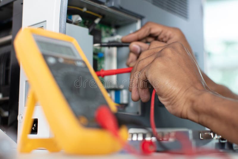 Man Testing Broken Laptop with Multimeter Stock Image - Image of ...