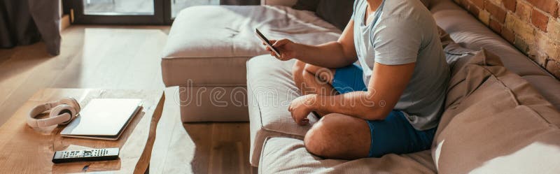 Young Man Chilling on a Walk on Sunset on the Beach. Medium Shot. Stock ...