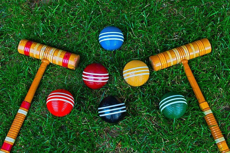 Croquet balls and mallets stock image. Image of color - 19861769