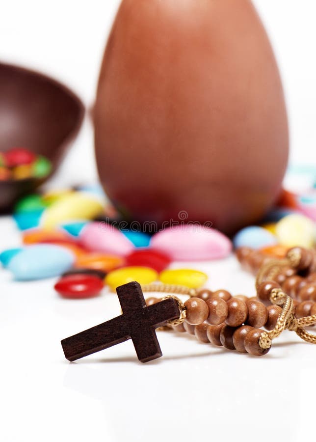 Cross Against Easter Chocolate Eggs and Sweets Stock Photo - Image of ...