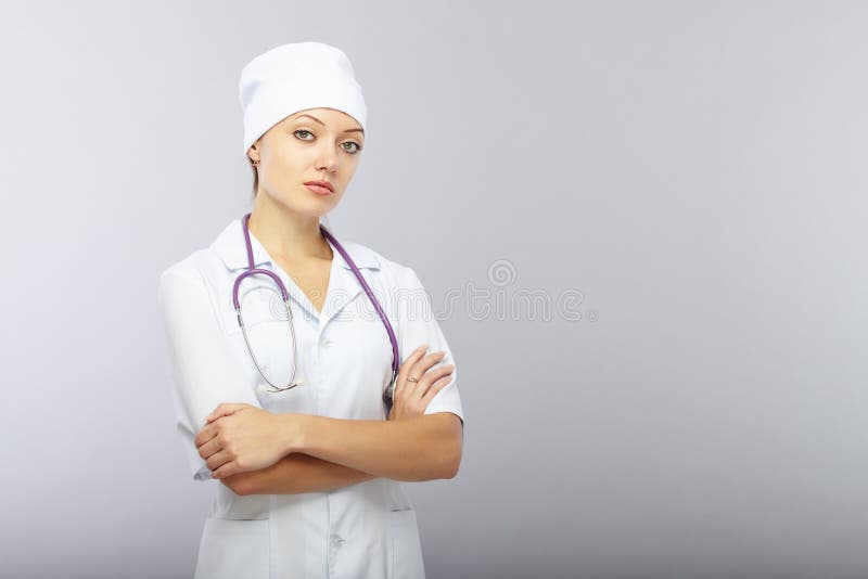 Cross-armed doctor stock image. Image of indoors, female - 11990655