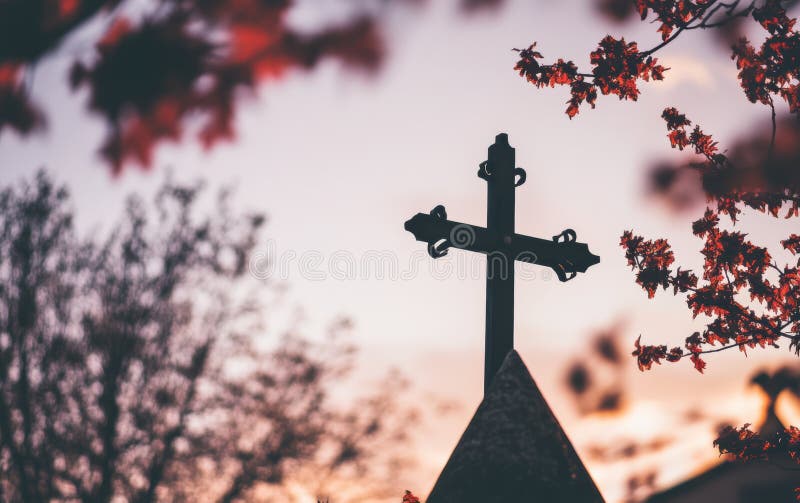 A Cross Atop a Building with a Tree Backdrop, Symbolizing Easter S ...