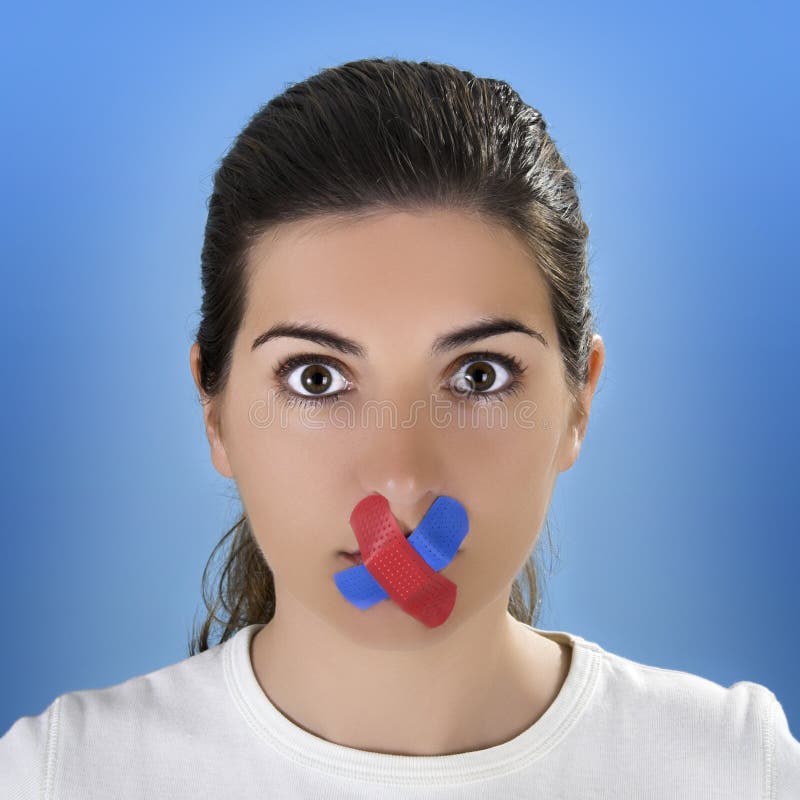 Cross Bandage on the mouth stock photo. Image of blue - 2162254