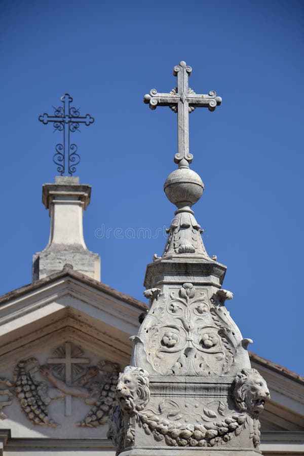 Cross on the Basilica of Saint Bartolomew in Rome Stock Image - Image ...