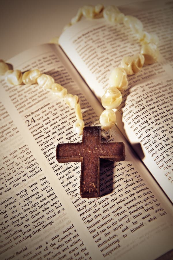 Cross on the Bible stock photo. Image of christian, english - 18622834