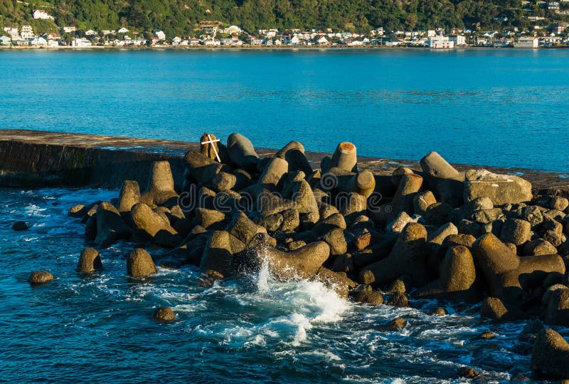 Breaker Bay Rocks, Wellington New Zealand Stock Photo - Image of clouds ...