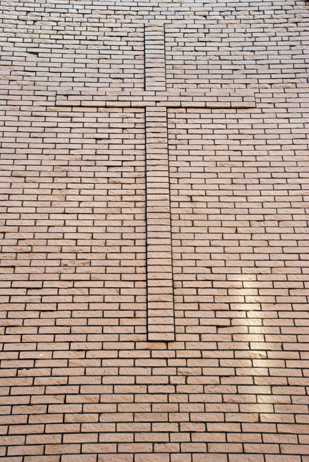 Cross on brick wall stock image. Image of city, material - 7337033