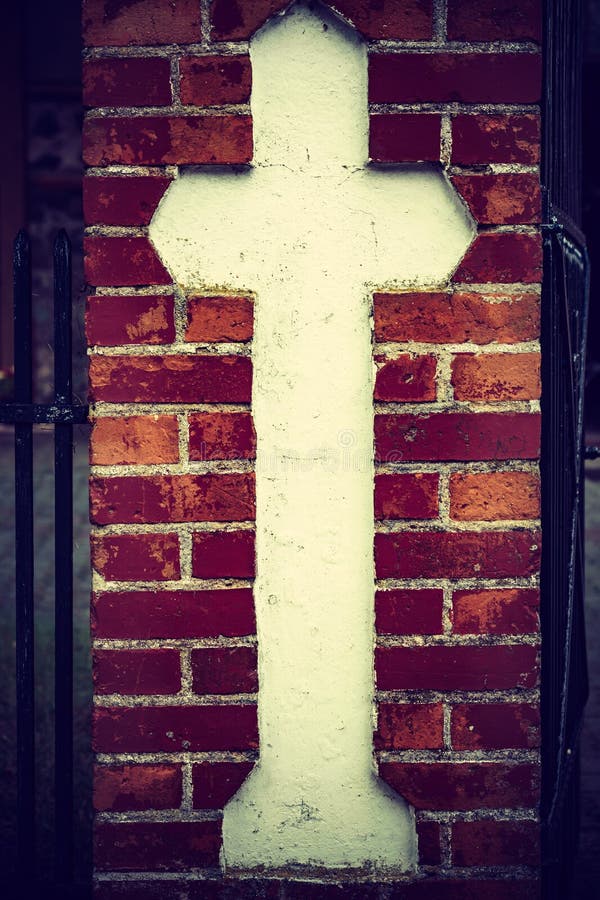 Cross on brick wall stock photo. Image of wall, symbol - 338652362