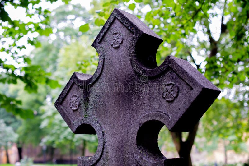 Cross in the Center of a Grassy Cemetery, Surrounded by Trees Stock ...