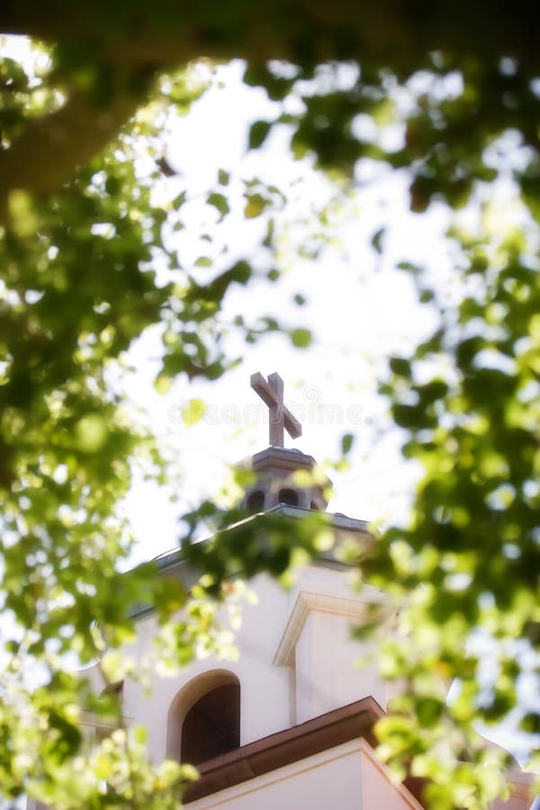 Cross on church steeple stock image. Image of branches - 32510999