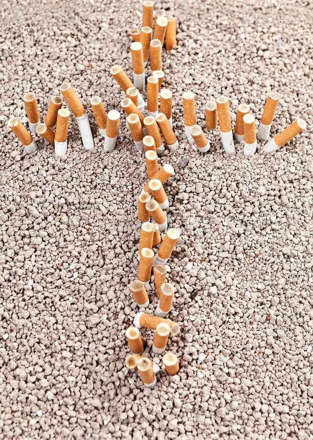 Cross of cigarettes stock photo. Image of vice, sand - 29335410