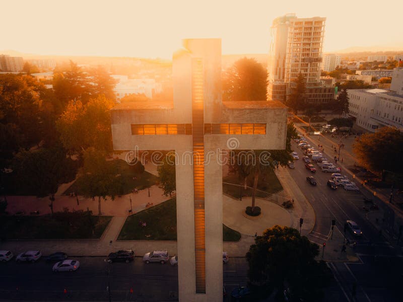 Cross in a City Setting during the Sunset Stock Image - Image of ...