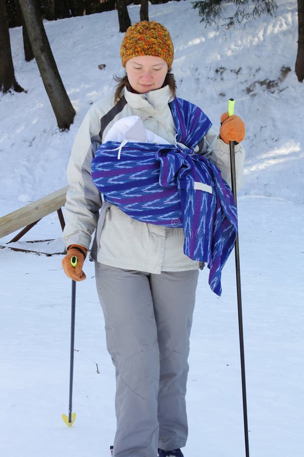 Cross Contry Skiing with Sling and Newborn Baby Stock Image - Image of ...