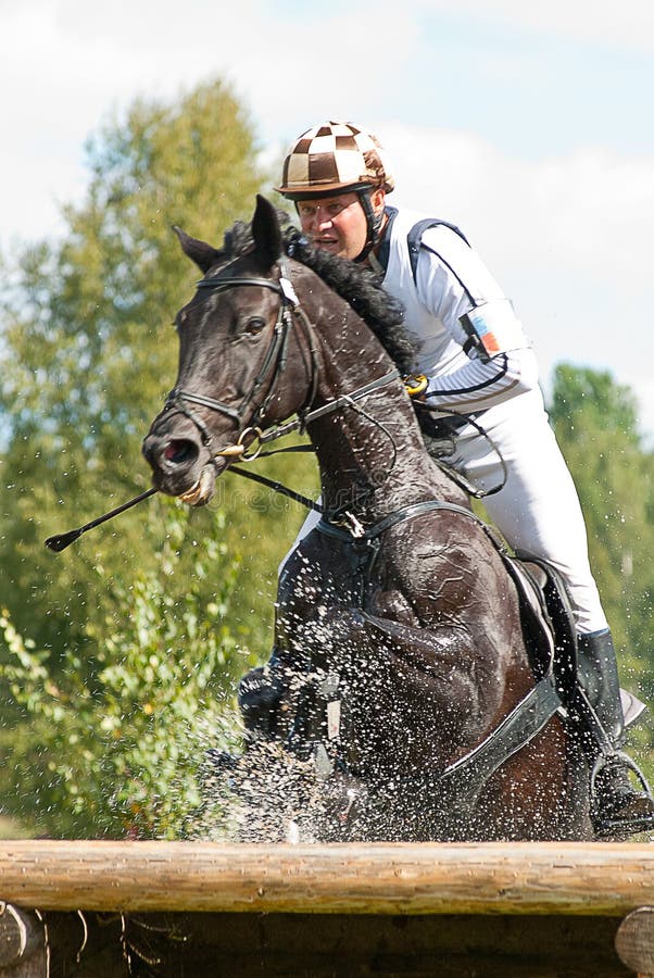 Cross-Country, Horseback Jumping in Splashes Water Editorial Photo ...