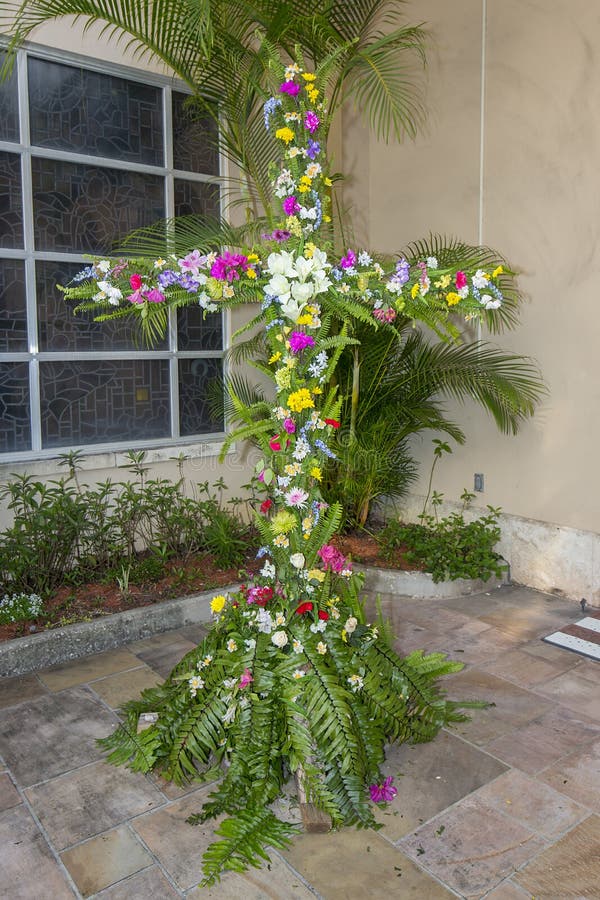 Cross Covered in Flowers stock image. Image of floral - 70754593